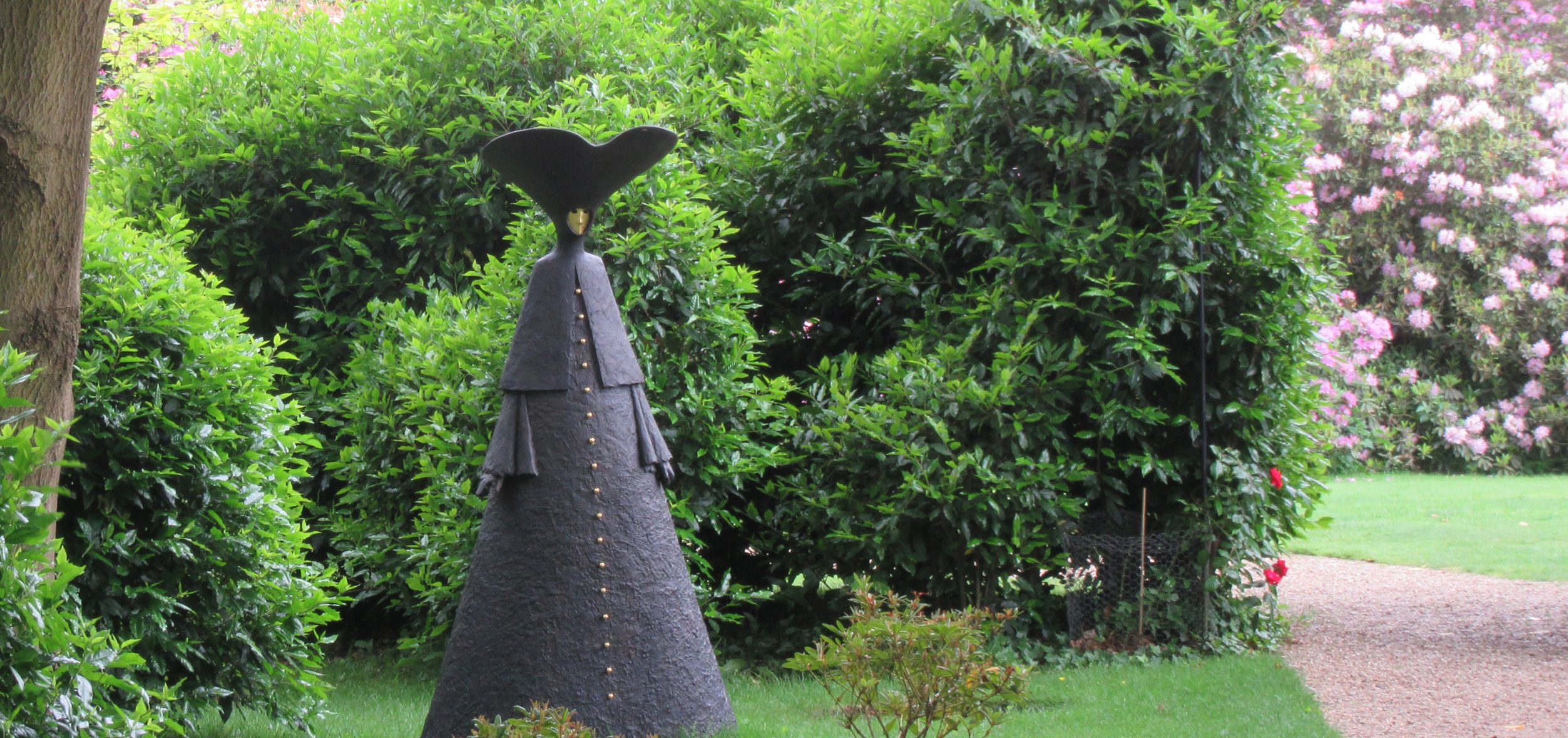 PASHLEY MANOR GARDENS Philip Jackson sculpture and rhododendrons by ...